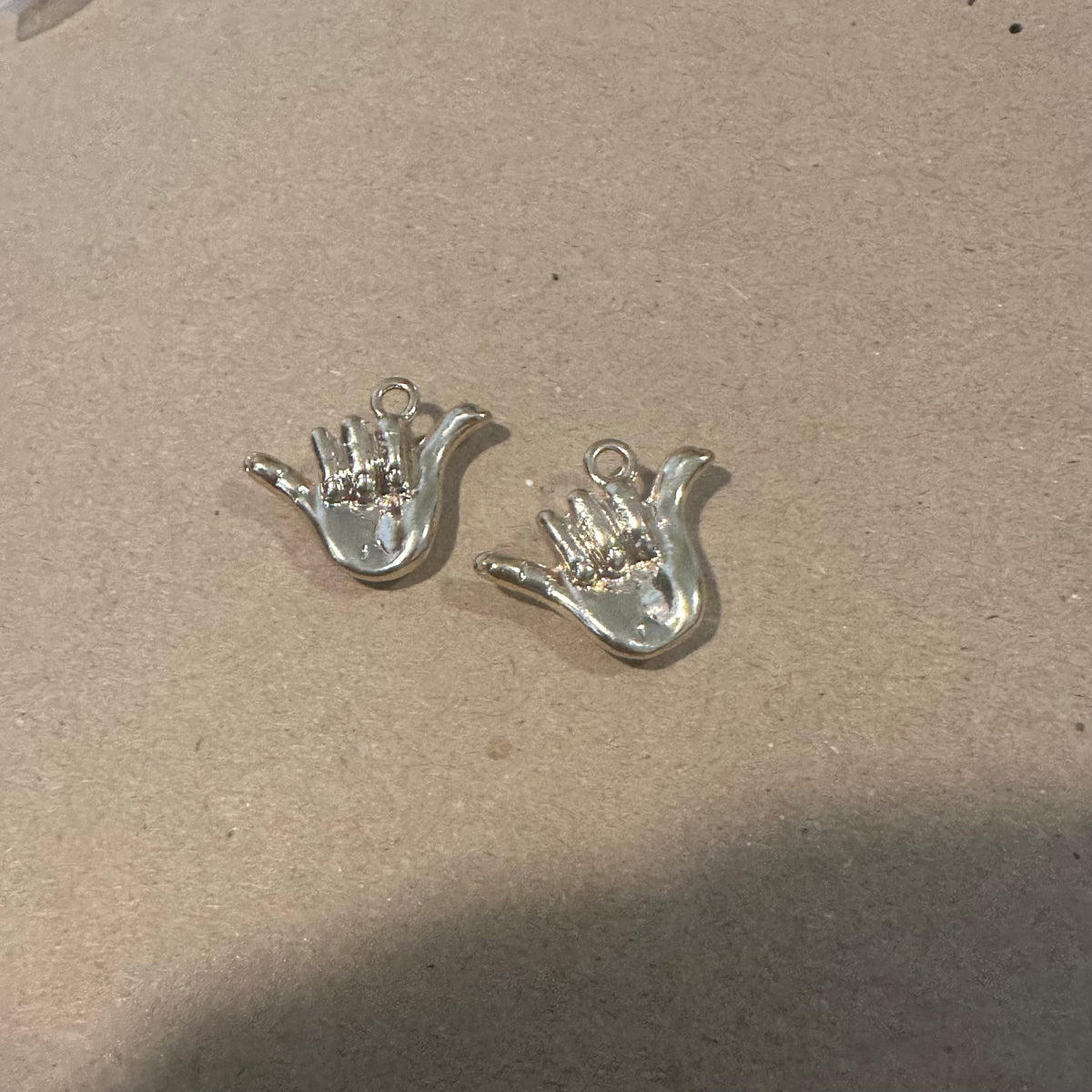 2 gold Alpha hands – Royalty and Beads