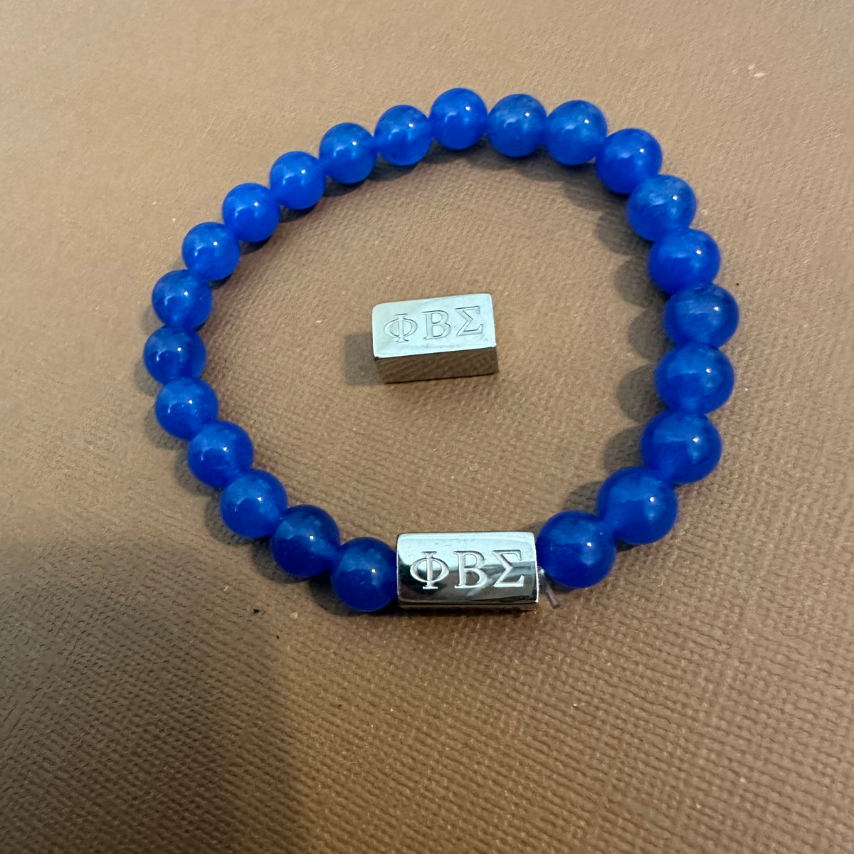 The silver Sigma – Royalty and Beads